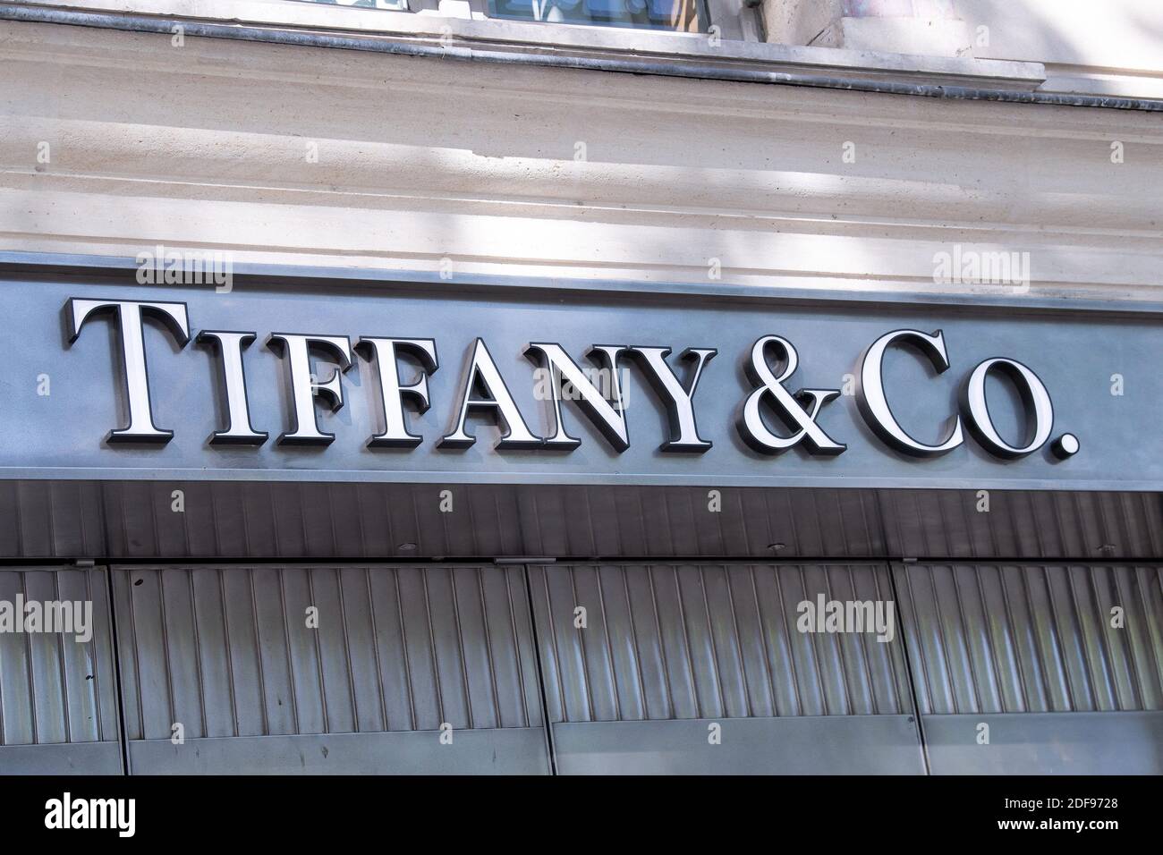 A shop sign of Tiffany & Co on April 14, 2020 in Paris, France. Photo ...