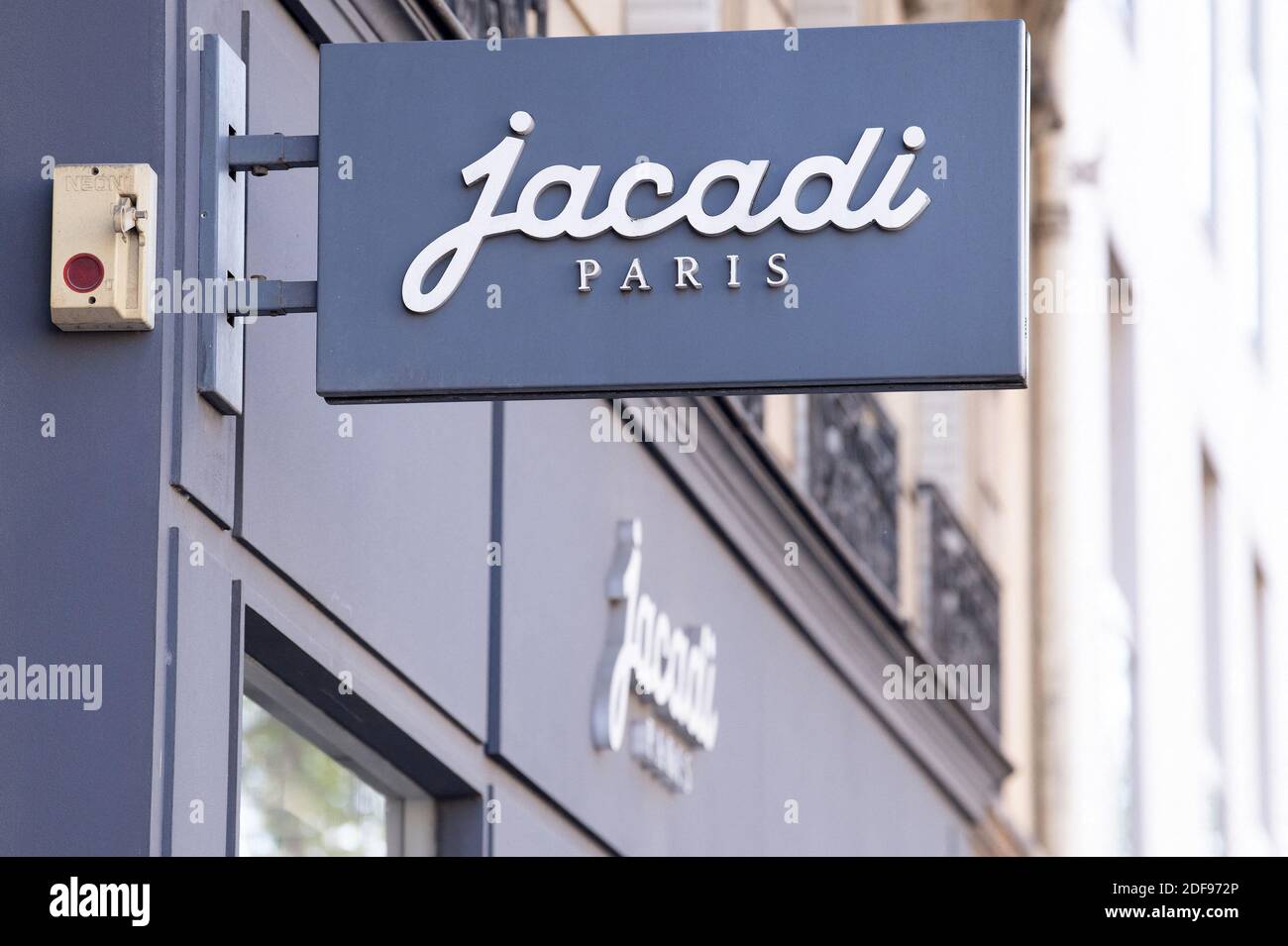 A shop sign of Jacadi on April 14, 2020 in Paris, France. Photo by ...