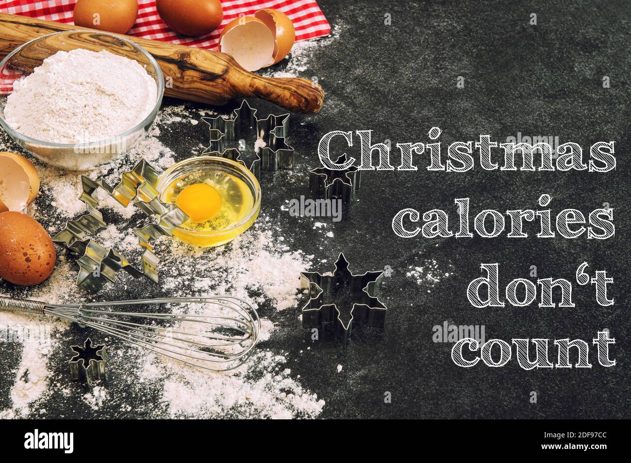 Christmas food. Baking ingredients and tolls. Flour, eggs, rolling pin ...