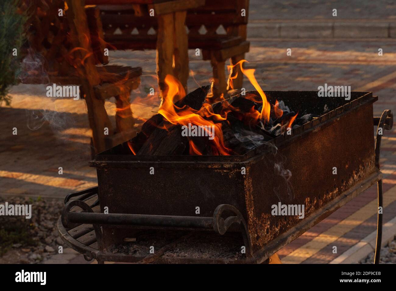 Grill flame burning fire for barbecue cooking outdoors. Outdoor grill ...