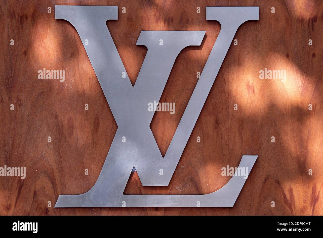 A shop sign of Louis Vuitton on April 22, 2020 in Paris, France. Photo ...