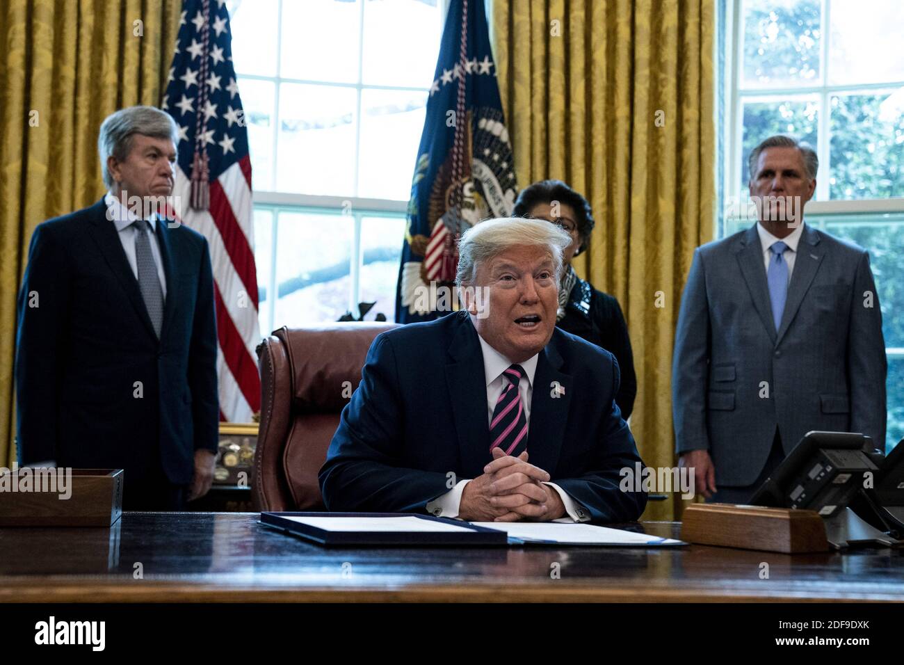 President Donald Trump speaks at a signing ceremony for H.R.266, the ...