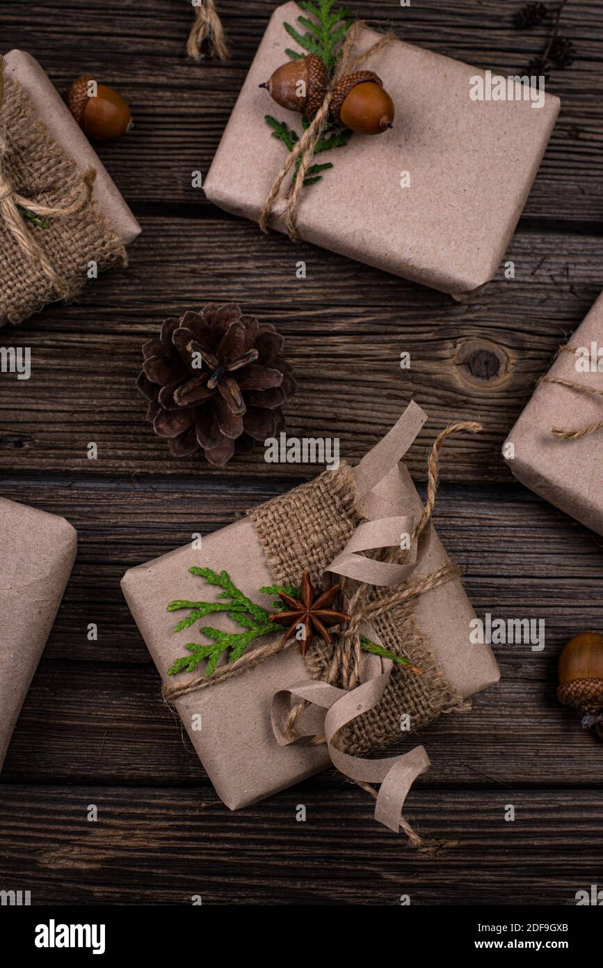 Christmas gift boxes in craft paper Stock Photo - Alamy