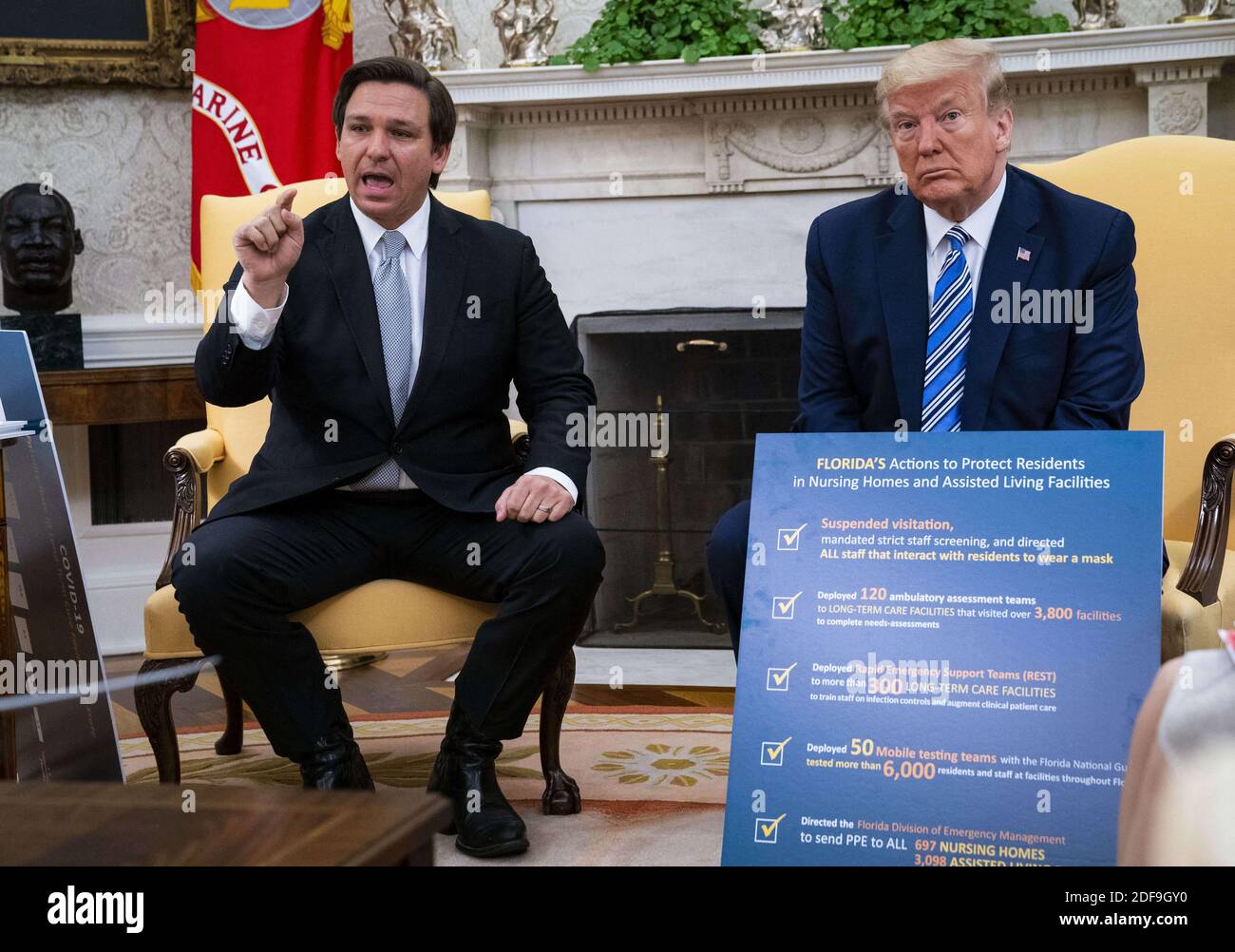 NYTVIRUS - President Donald Trump looks on as Florida Governor Ron ...
