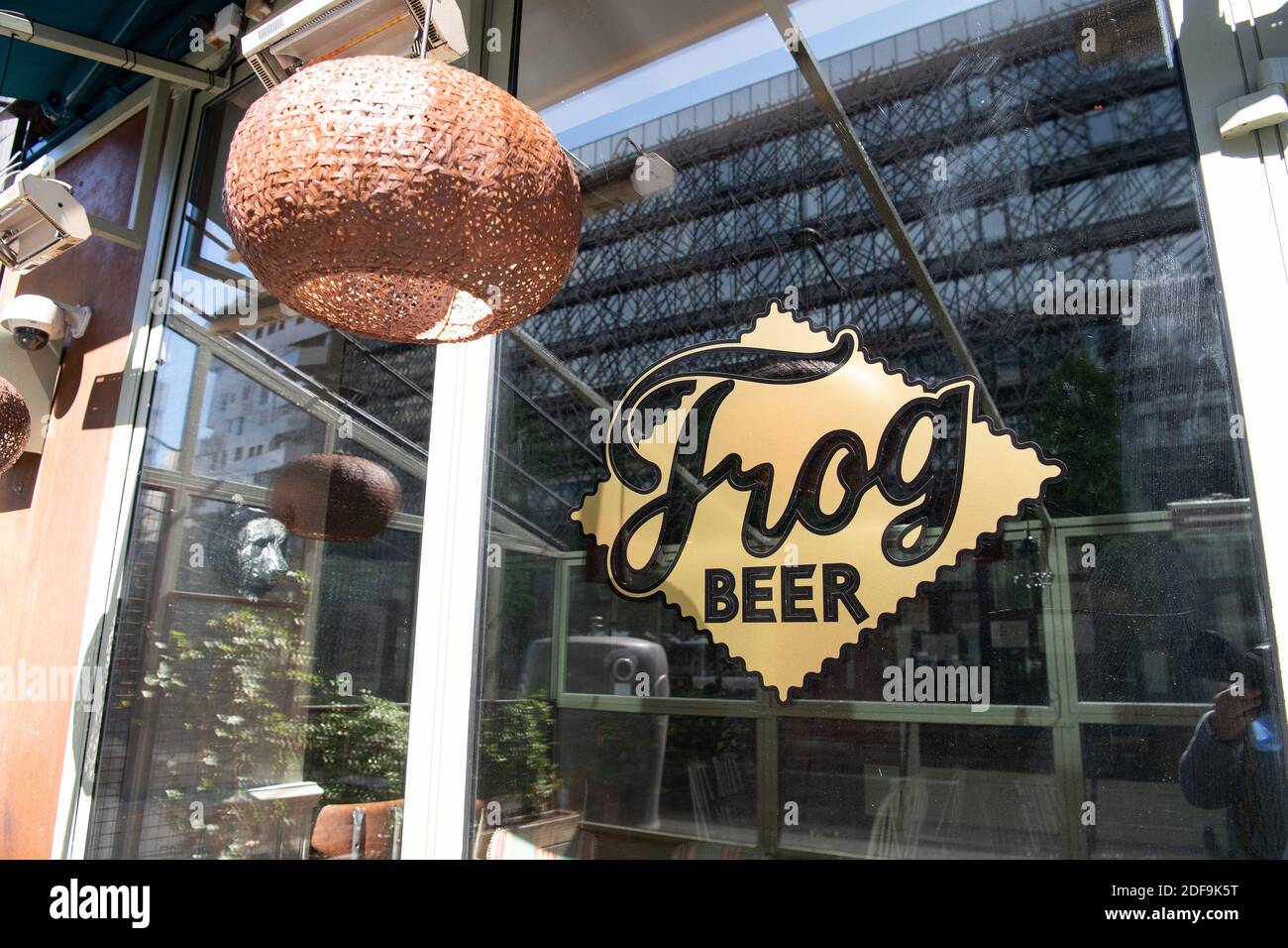 A shop sign of Frog Hop House on April 30, 2020 in Paris, France.Photo ...