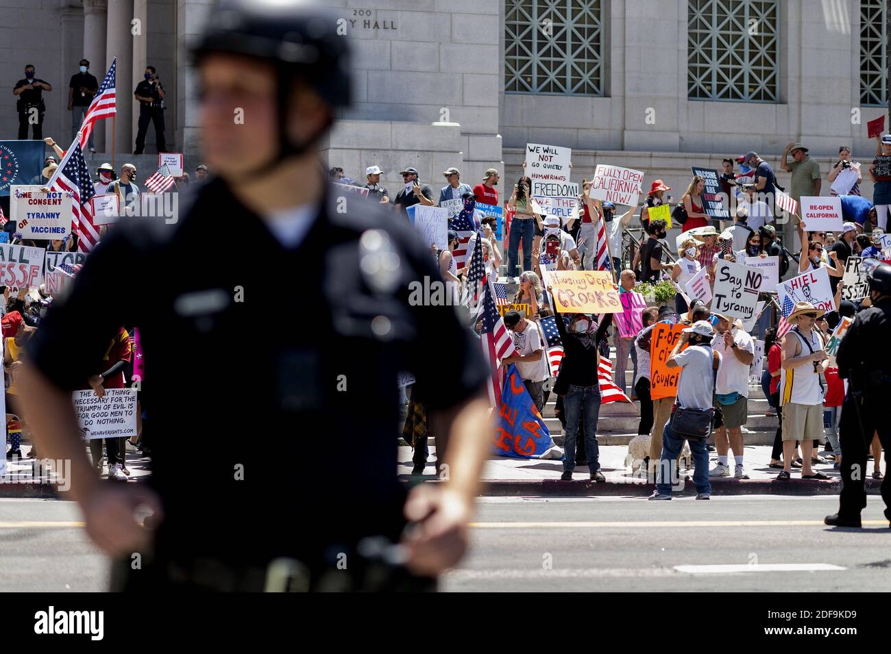 Demonstrators protest in front of the Los Angeles City Hall to demand ...