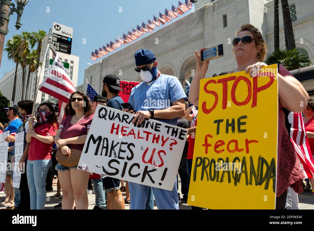 Demonstrators protest in front of the Los Angeles City Hall to demand ...