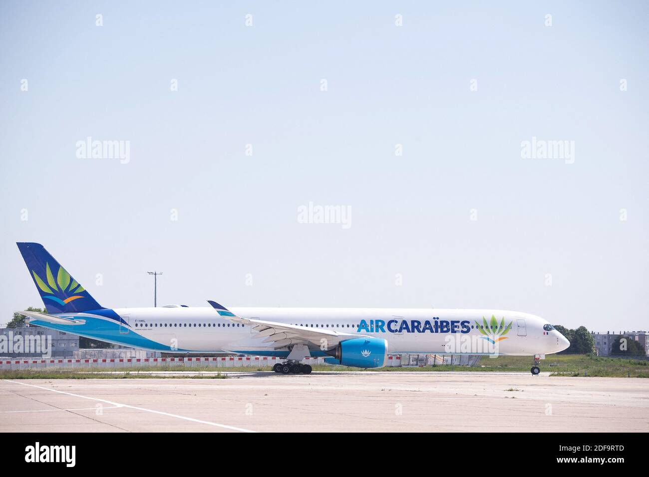 Aircrafts of Air Caraibes Airlines company are parked on the tarmac at ...