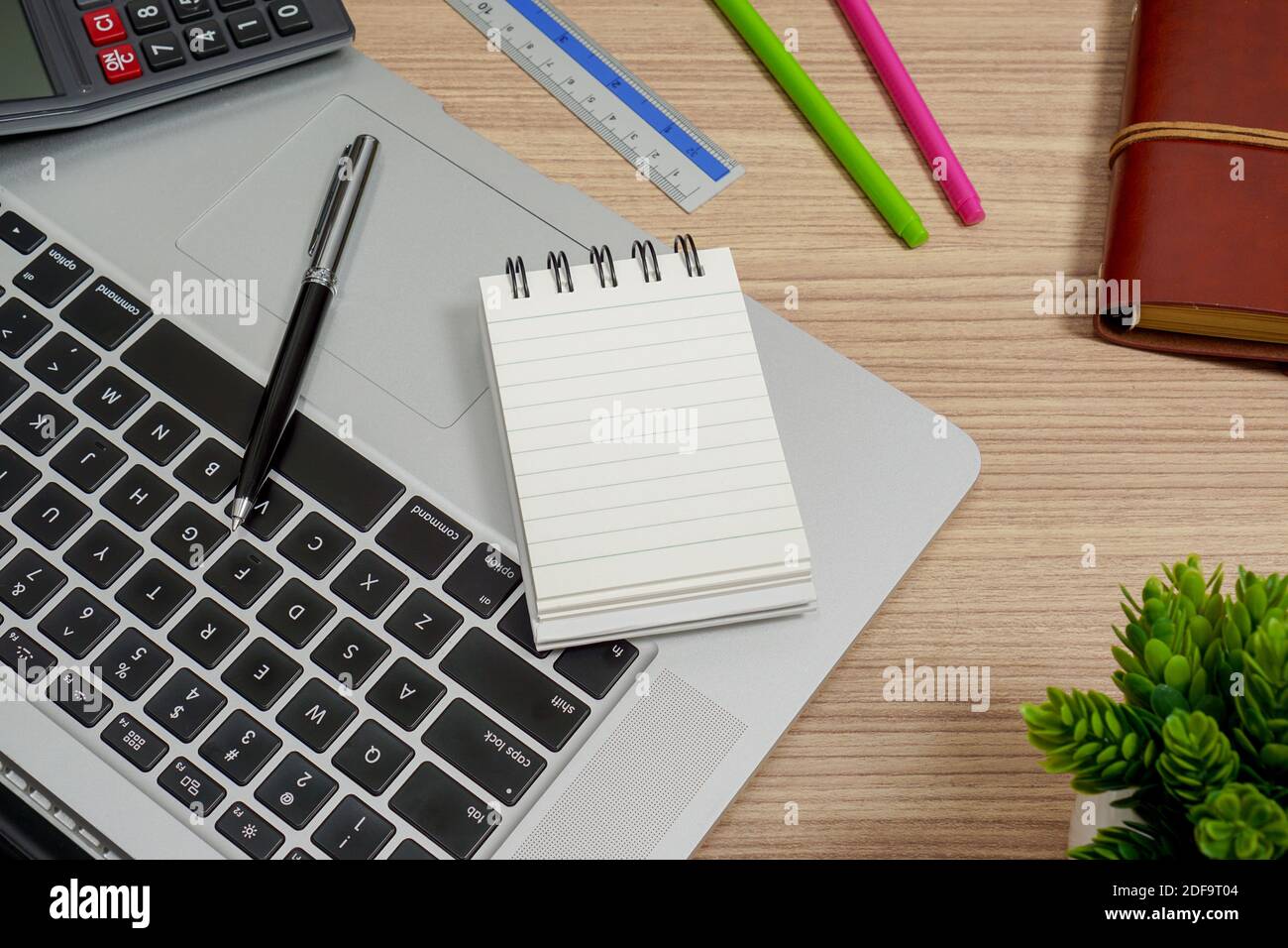 Wood desk notebook working hi-res stock photography and images - Alamy