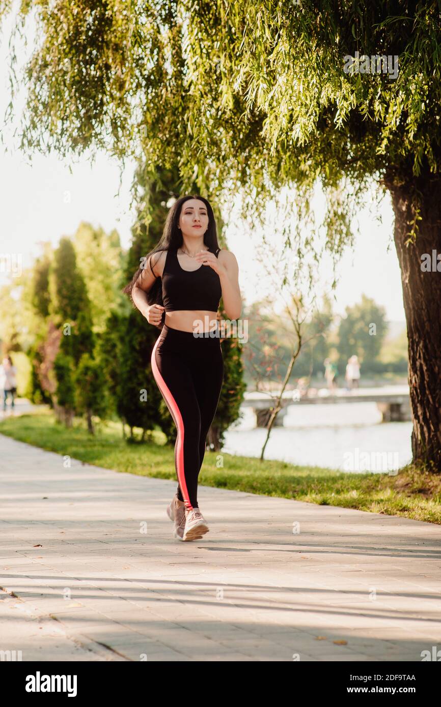 Fitness sport girl in fashion sportswear doing yoga fitness exercise in ...