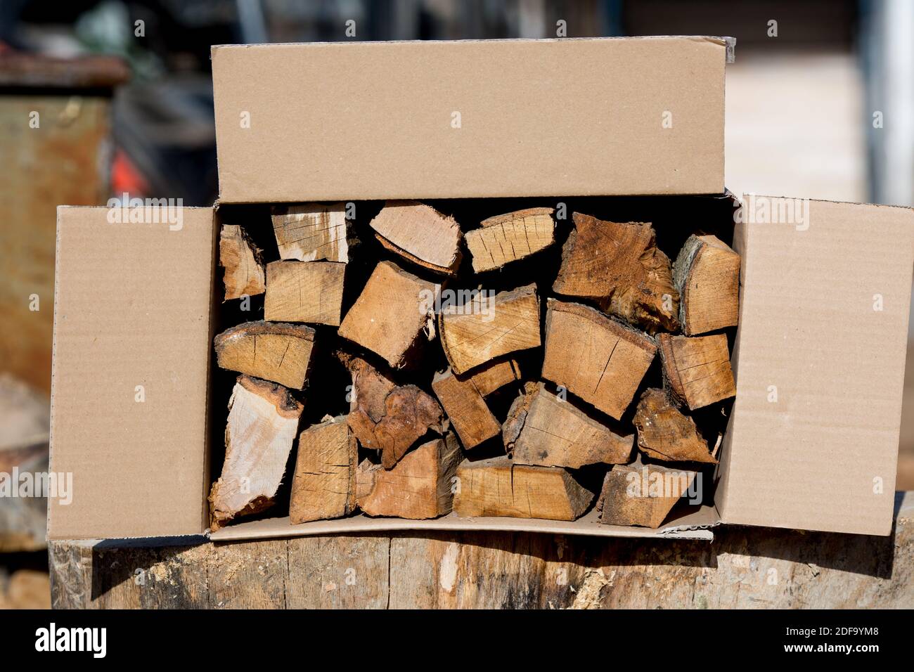 Firewood in a cartoon box Stock Photo - Alamy