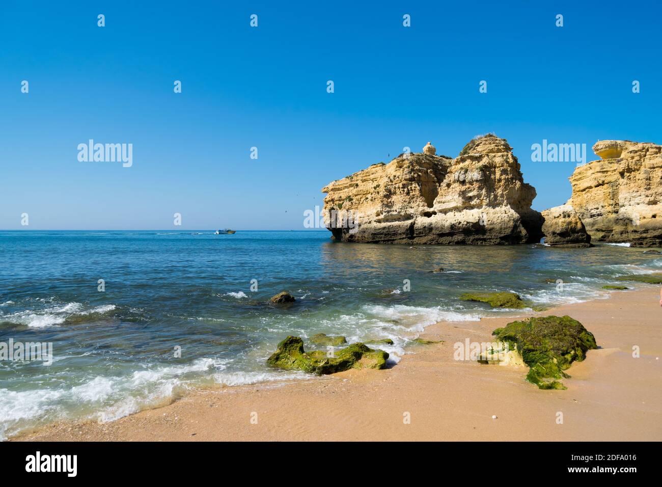 Algarve beaches in Portugal with rocks on the clean water ocean ...