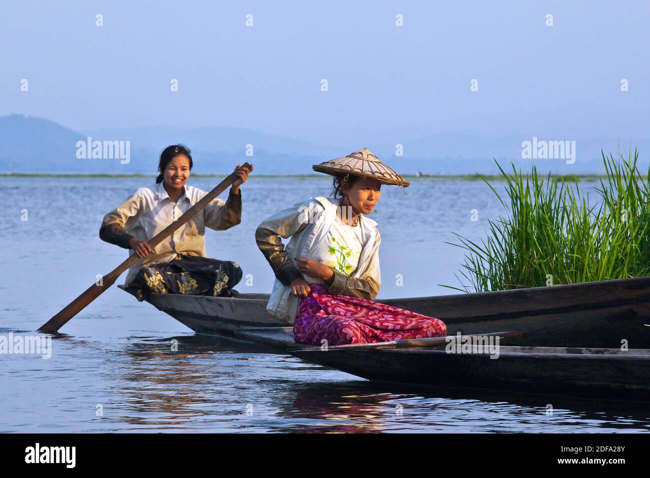Hand made WOODEN BOATS are the main form of transportation on INLE LAKE ...
