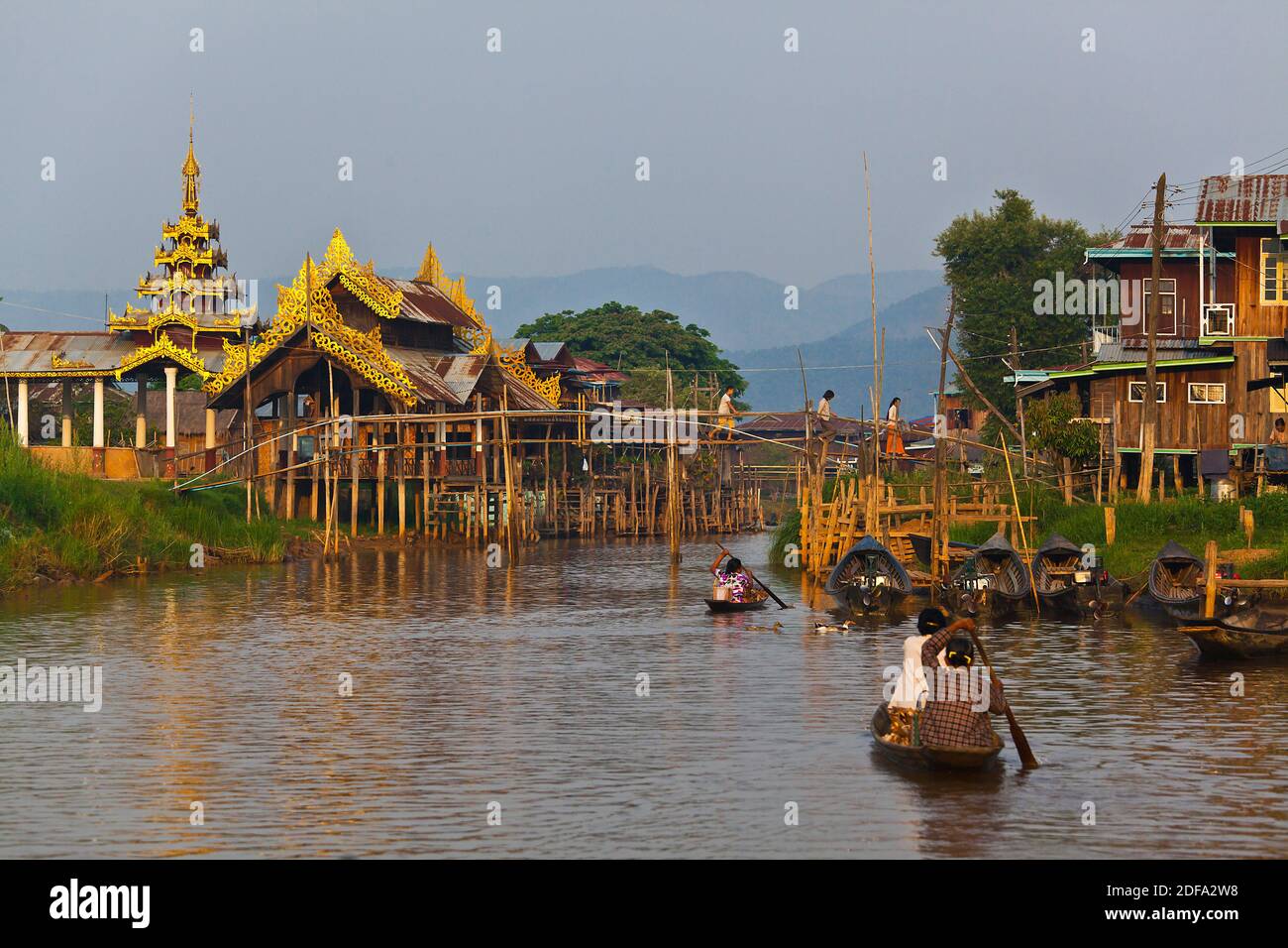 Hand made WOODEN BOATS are the main form of transportation on INLE LAKE ...