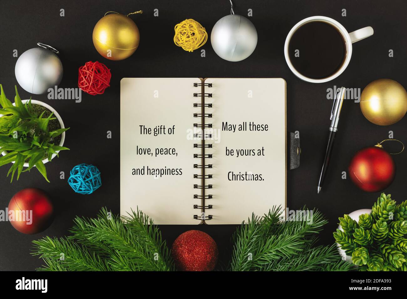 Notepad with season's greetings wish and ornament balls decoration ...