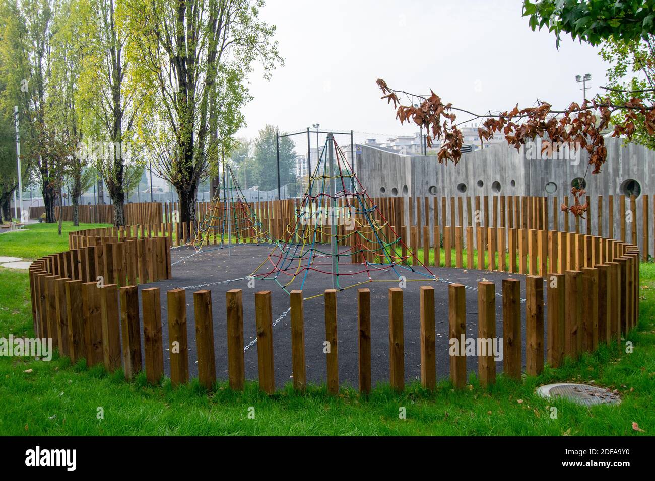 Empty kids playground with wood fence, social distancing measures Stock ...