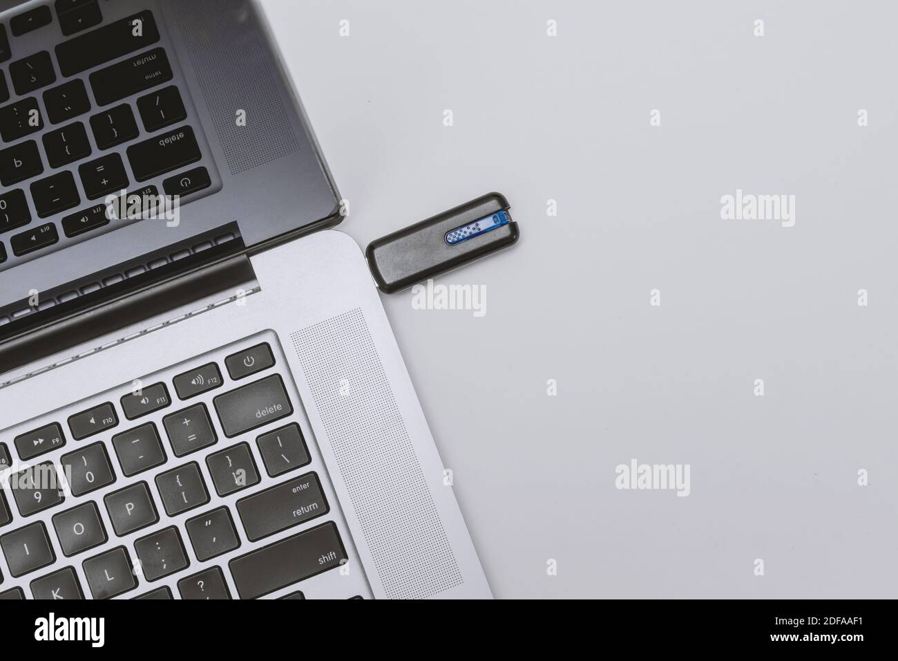 Close Up VIew of USB Stick Plugged Into Laptop Port Stock Photo - Alamy