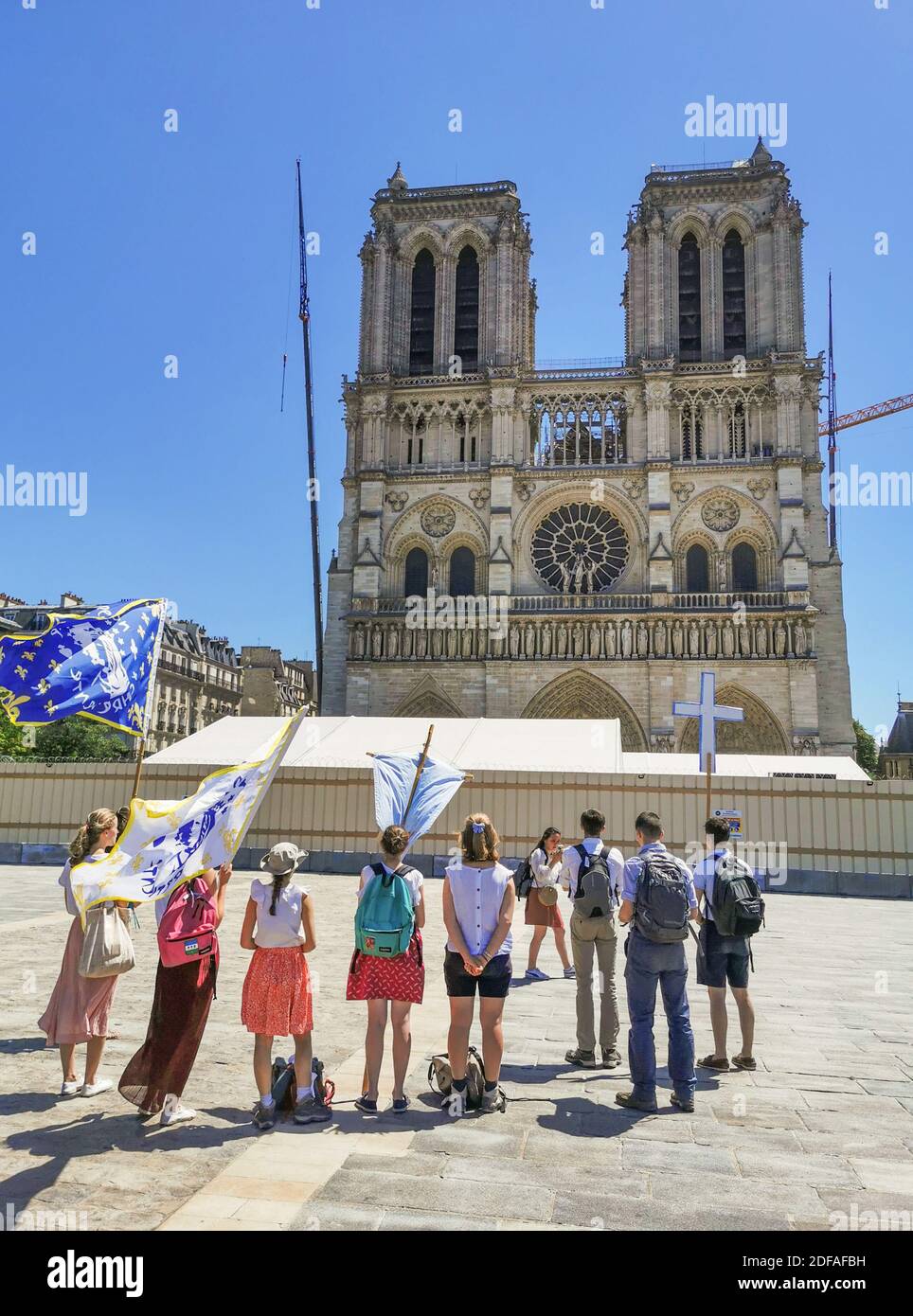 Christian faithfuls praying in front of Cathedrale Notre-Dame to ...