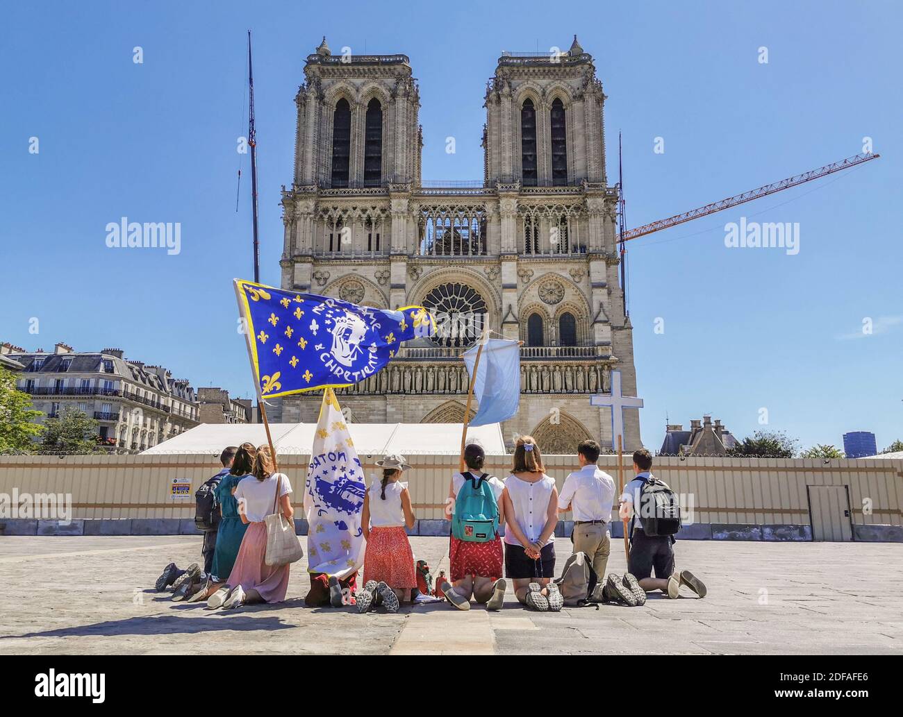 Christian faithfuls praying in front of Cathedrale Notre-Dame to ...