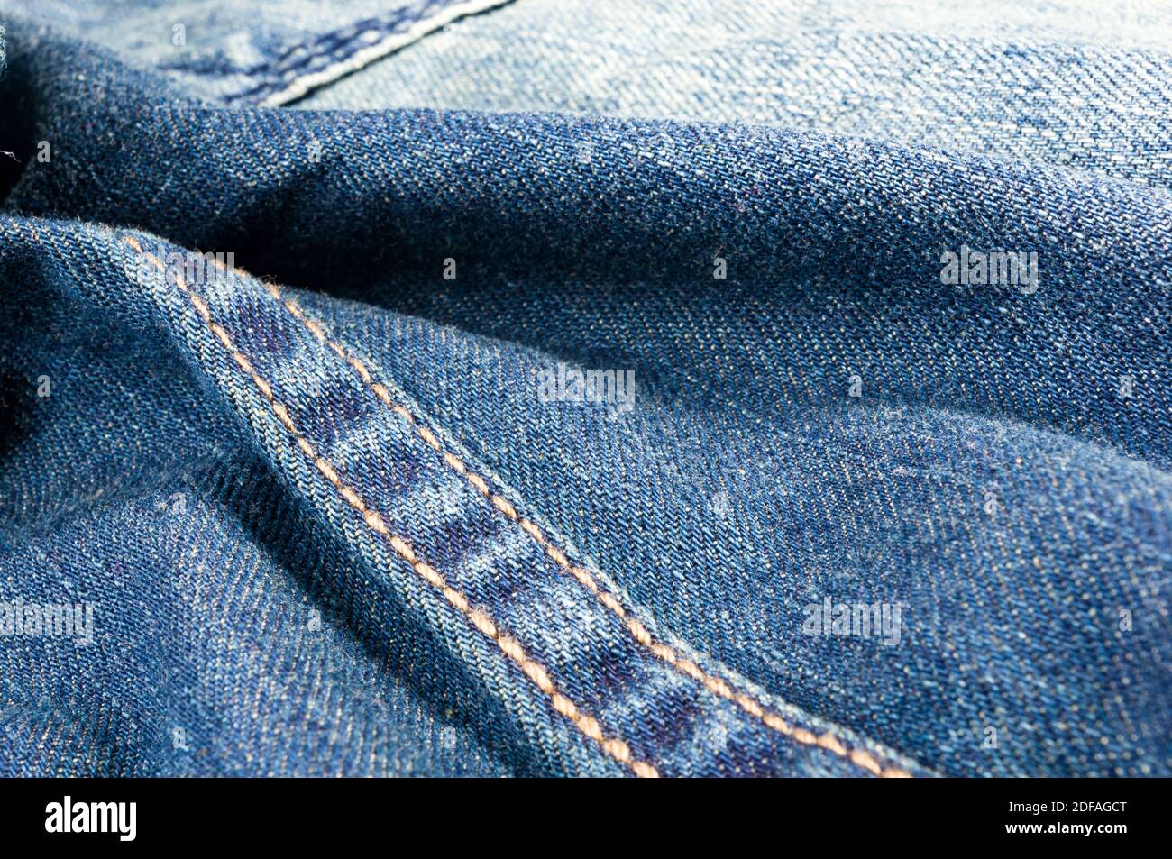 clothing items blue washed faded jeans cotton fabric texture with seams ...