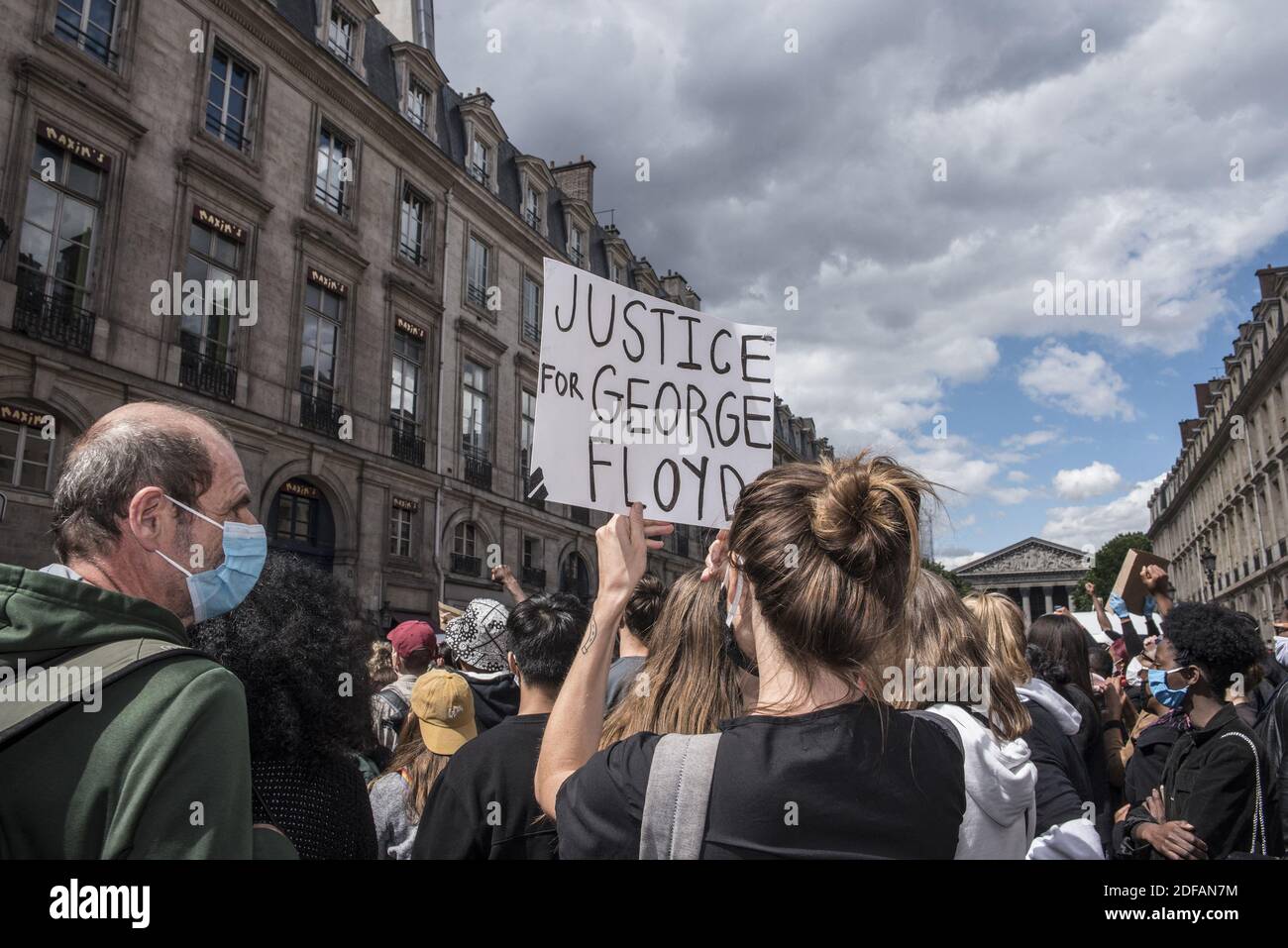 People protest against racism and police brutality at the place de la ...
