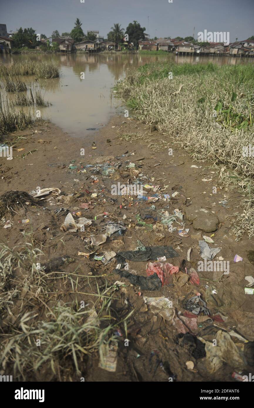 Plastics trash seen stranded in the Silau river at Kampung Baru village ...
