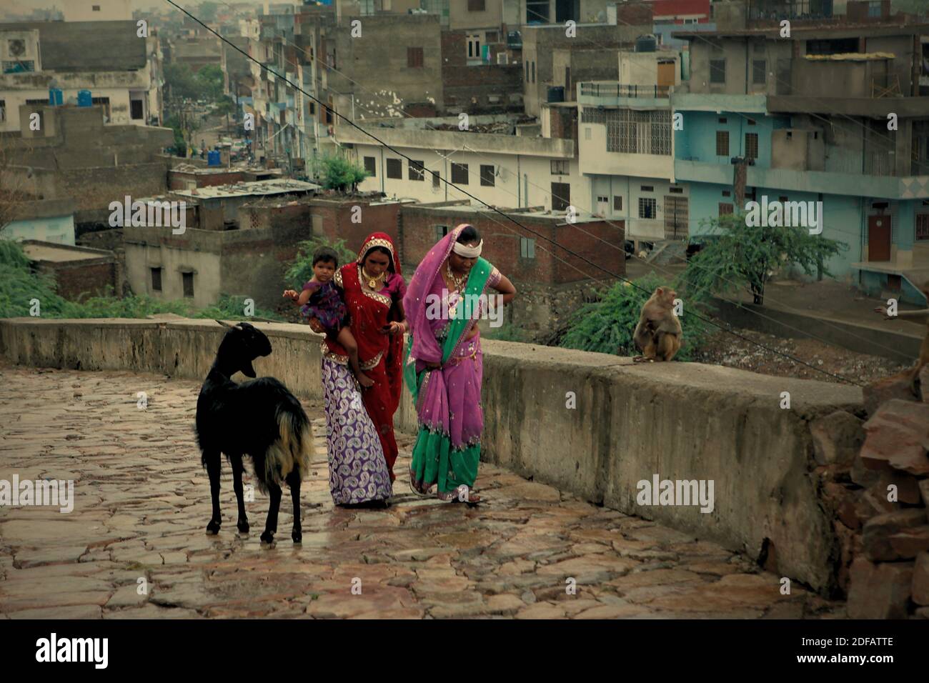 Women walking on the path leading to Surya Mandir (Sun Temple) in ...