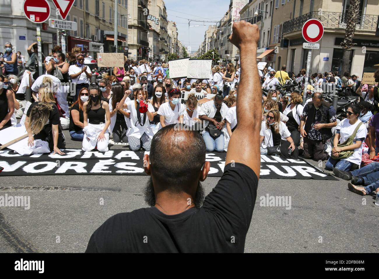 Health workers take part in a demonstration as part of a nationwide day ...