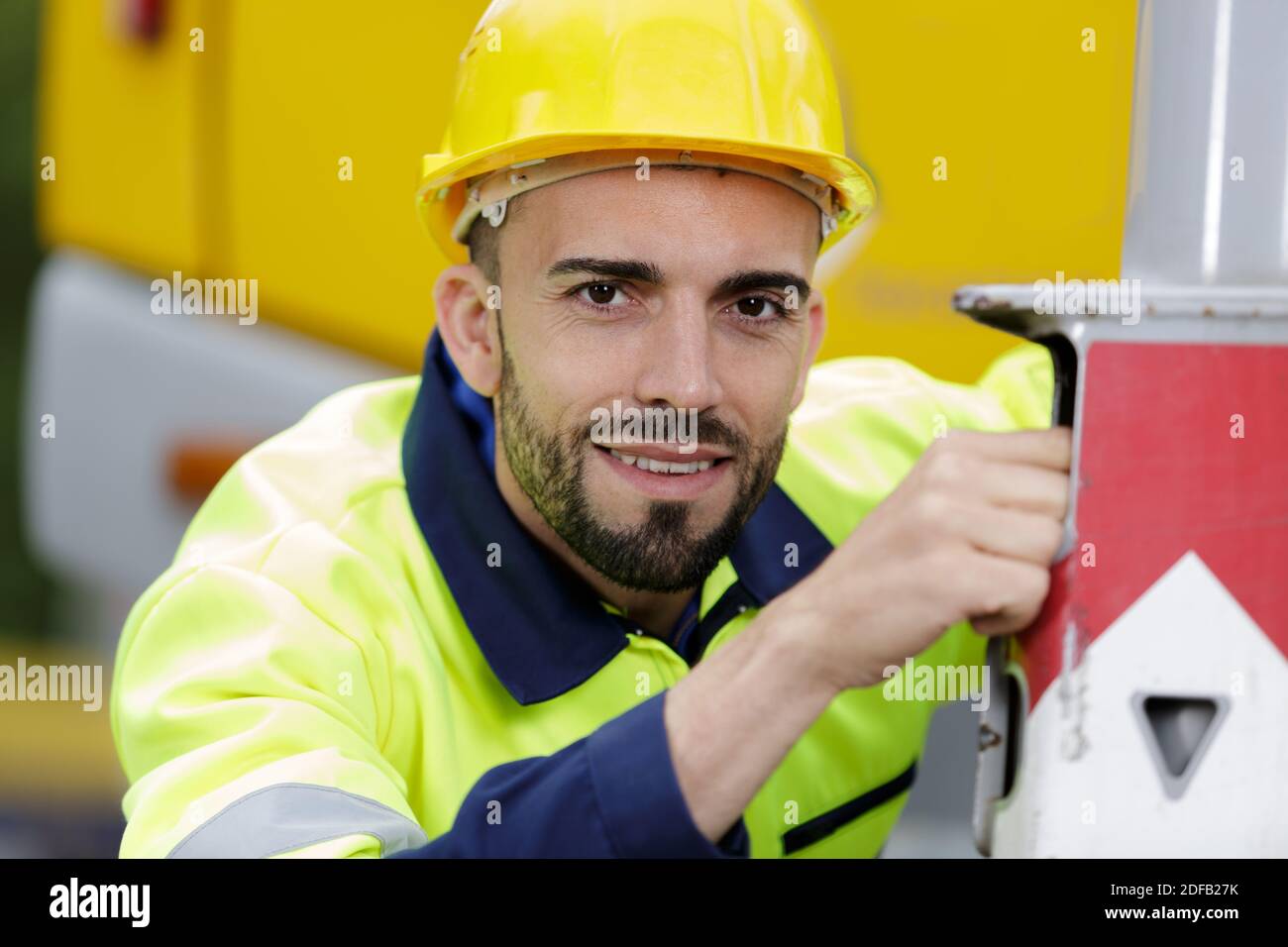 close view of construction worker wearing reflective gear Stock Photo ...