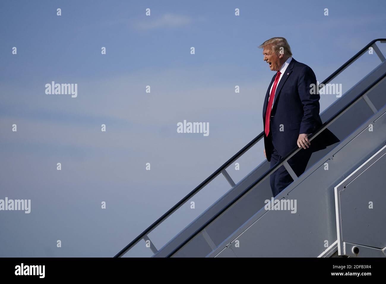 President Donald Trump exits Air Force One as he arrives at Tulsa ...
