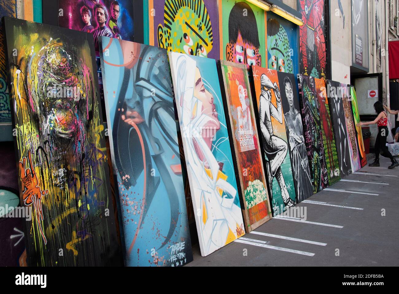 Paintings by different street artists are seen as a street art ...