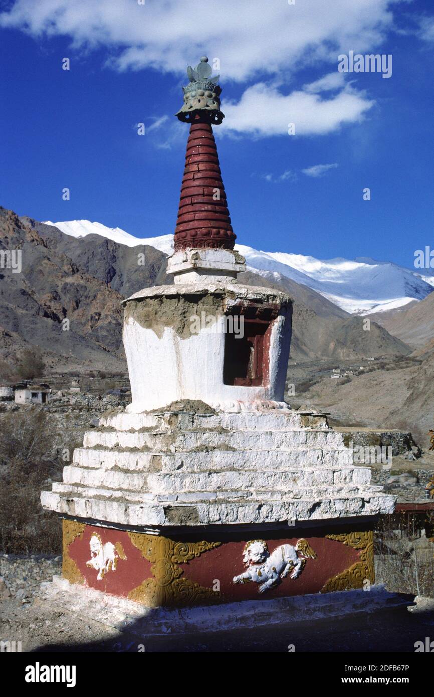 Painted adobe CHORTEN, with SNOW LIONS carved on sides, LEKIR GOMPA ...