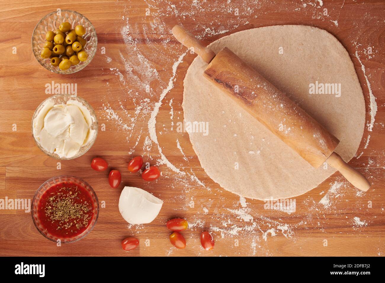 Making italian pizza step by step with ingredients for hand made pizza ...