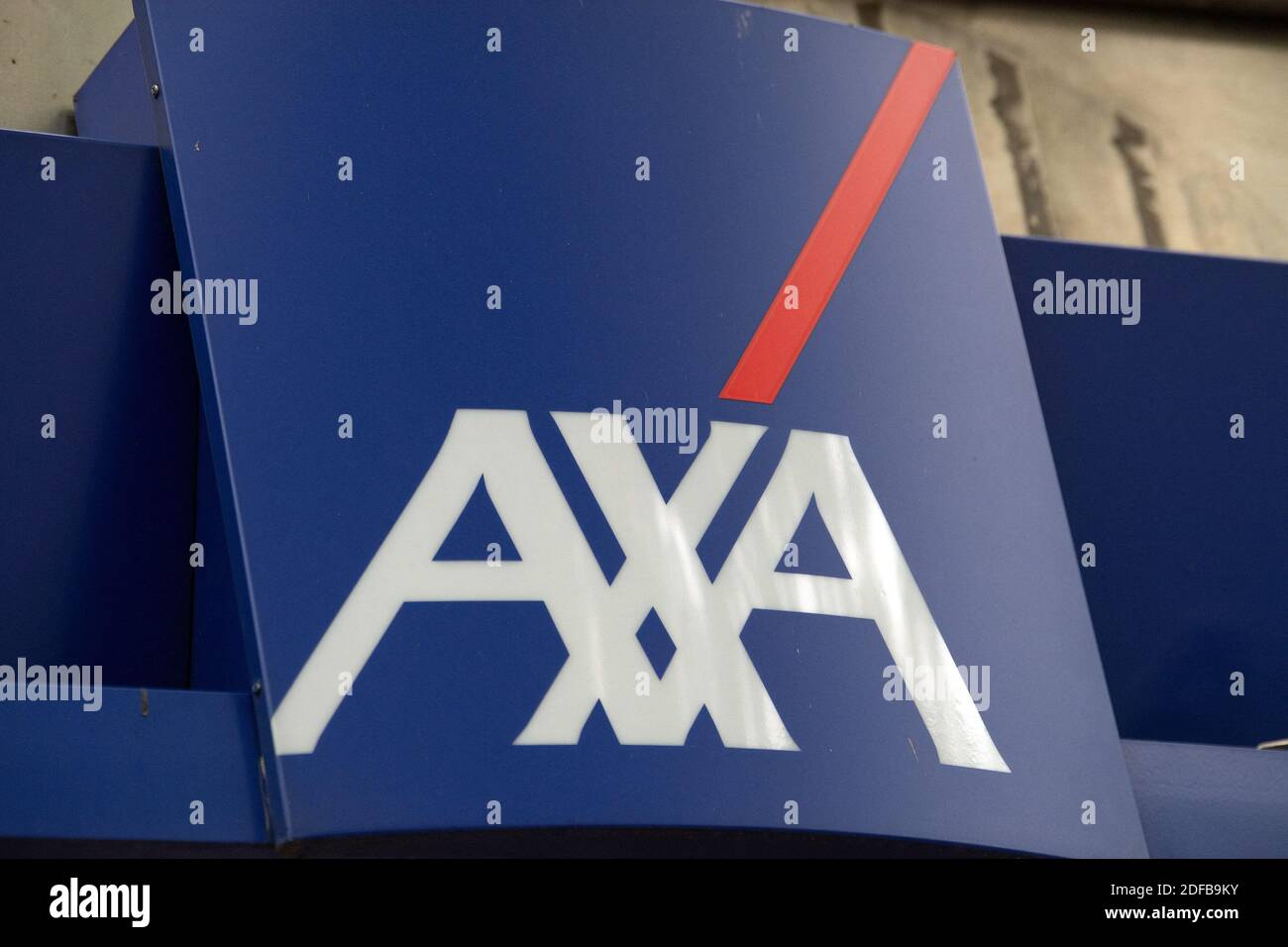 A shop sign of AXA, on June 28, 2020 in Paris, France. Photo by David ...