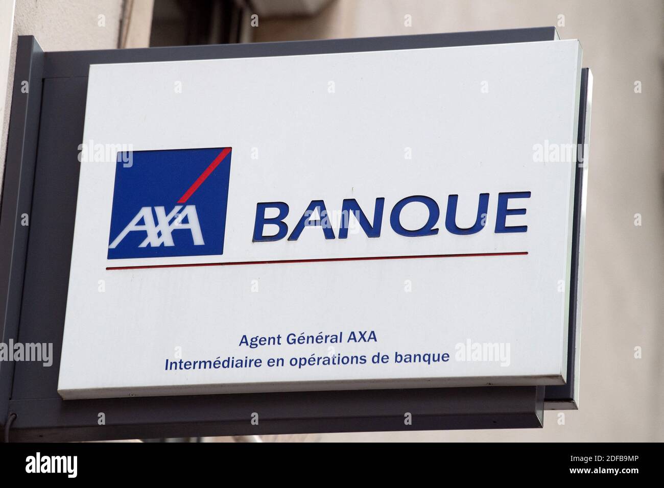 A shop sign of AXA Banque, on June 28, 2020 in Paris, France. Photo by ...