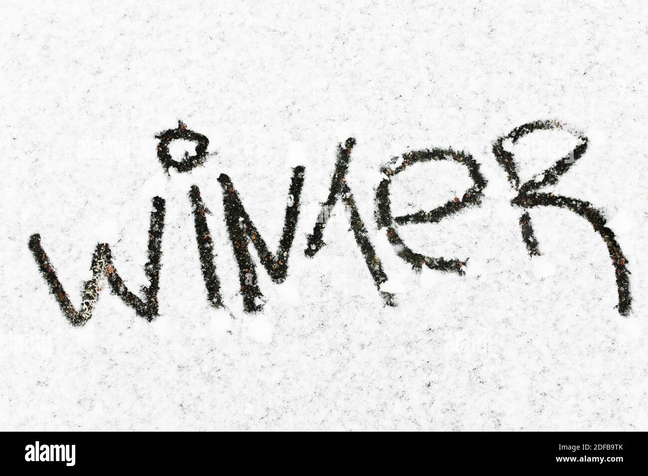 The word Winter written in snow. Snowy background Stock Photo - Alamy