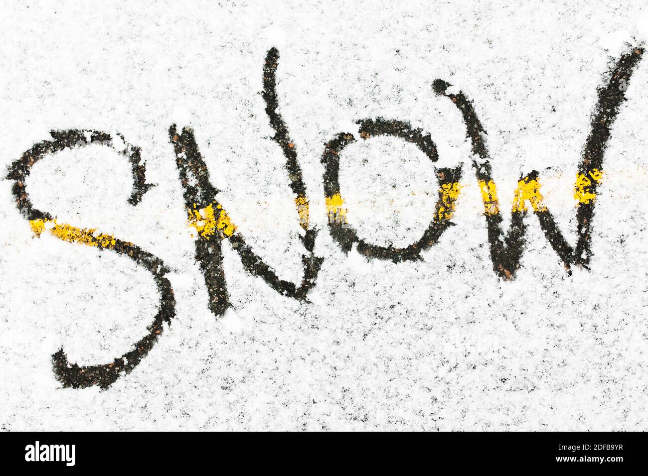 The word snow written in snow. Snowy background Stock Photo - Alamy