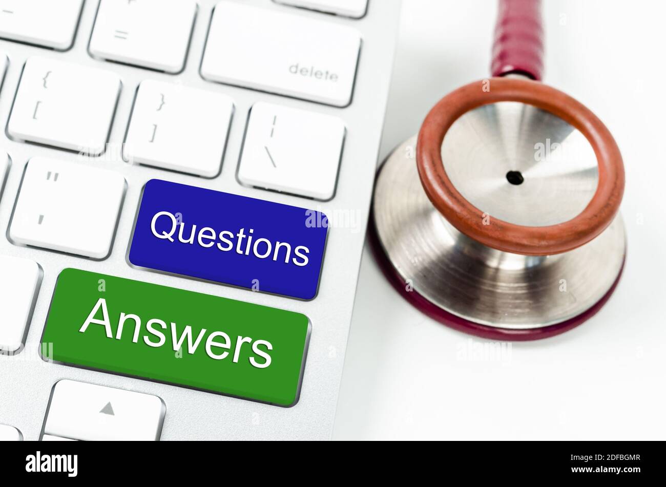 Questions and answer button and stethoscope with keyboard computer ...