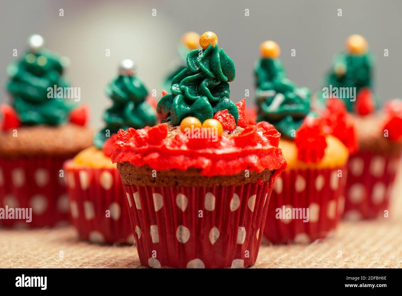 Christmas decorated mini cupcakes with buttercream icing and sprinkles ...