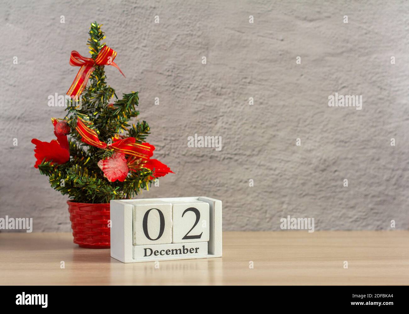 December 2.One day of the month, a calendar with a small Christmas tree ...