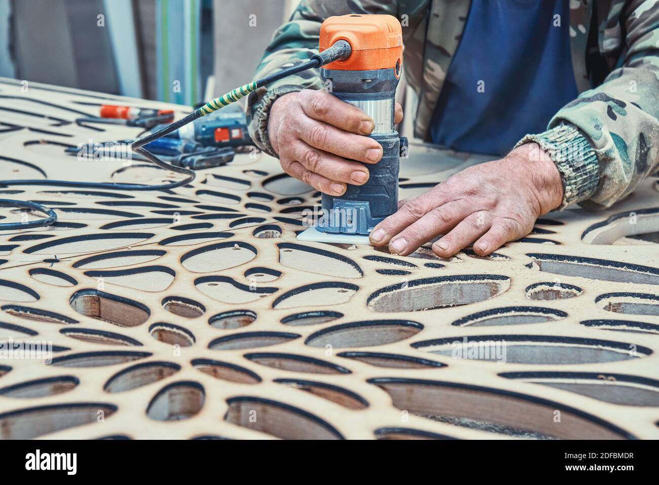 Decorative partition wall manufacturing process. Carpenter milling ...