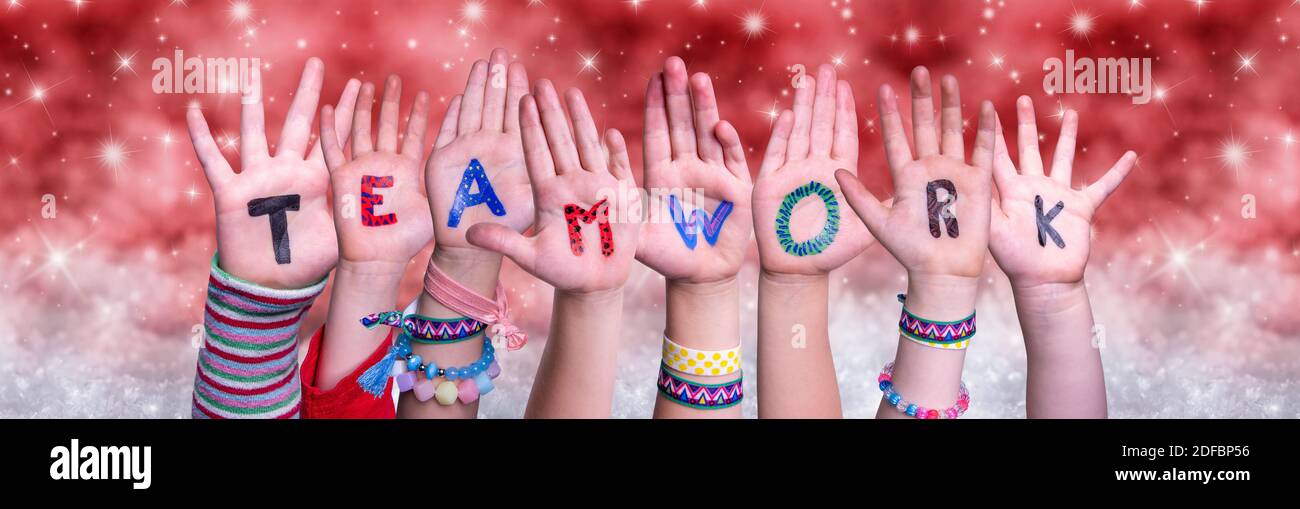 Children Hands Building Word Teamwork, Red Christmas Background Stock ...