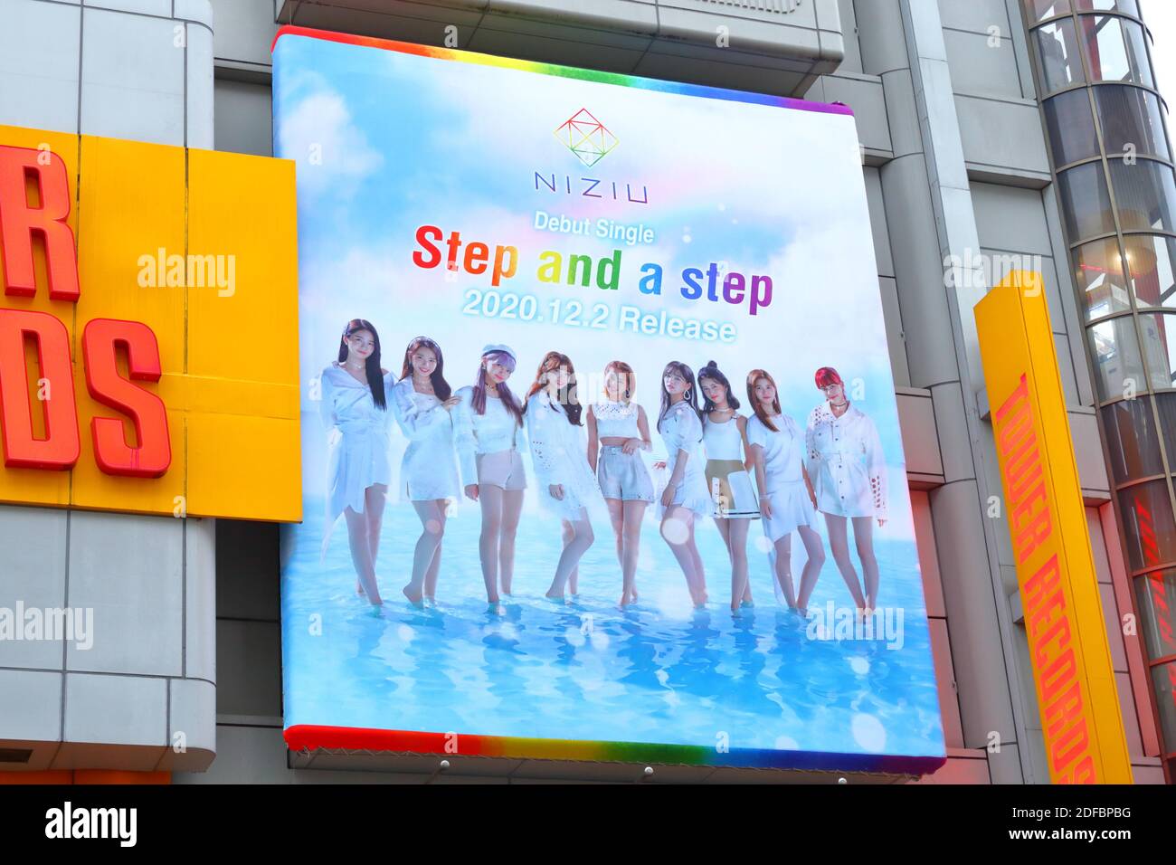 A billboard of Japanese girl group NiziU is seen on Tower Records at ...
