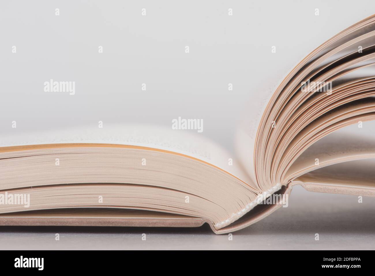 Opened book close-up education concept Stock Photo - Alamy