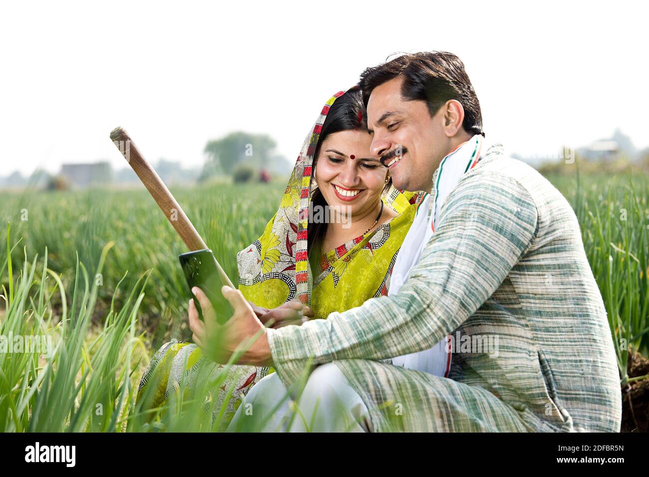 Indian farmer mobile phone hi-res stock photography and images - Alamy