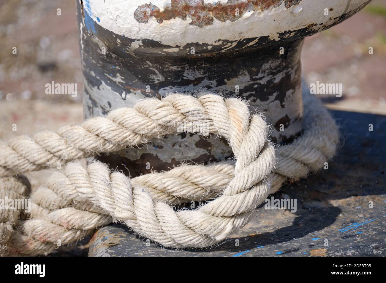 Abstract Background texture of thick, strong rope on the harbor quay ...