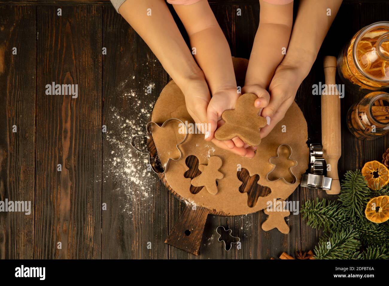 Christmas gingerbread man in child hands. Holiday, family, home comfort ...
