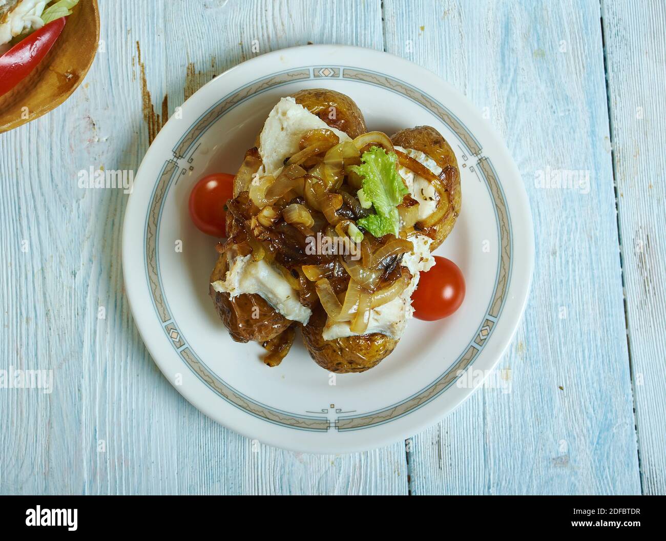 Bacalhau a lagareiro - Portuguese Grilled Salted Cod Fish Stock Photo ...