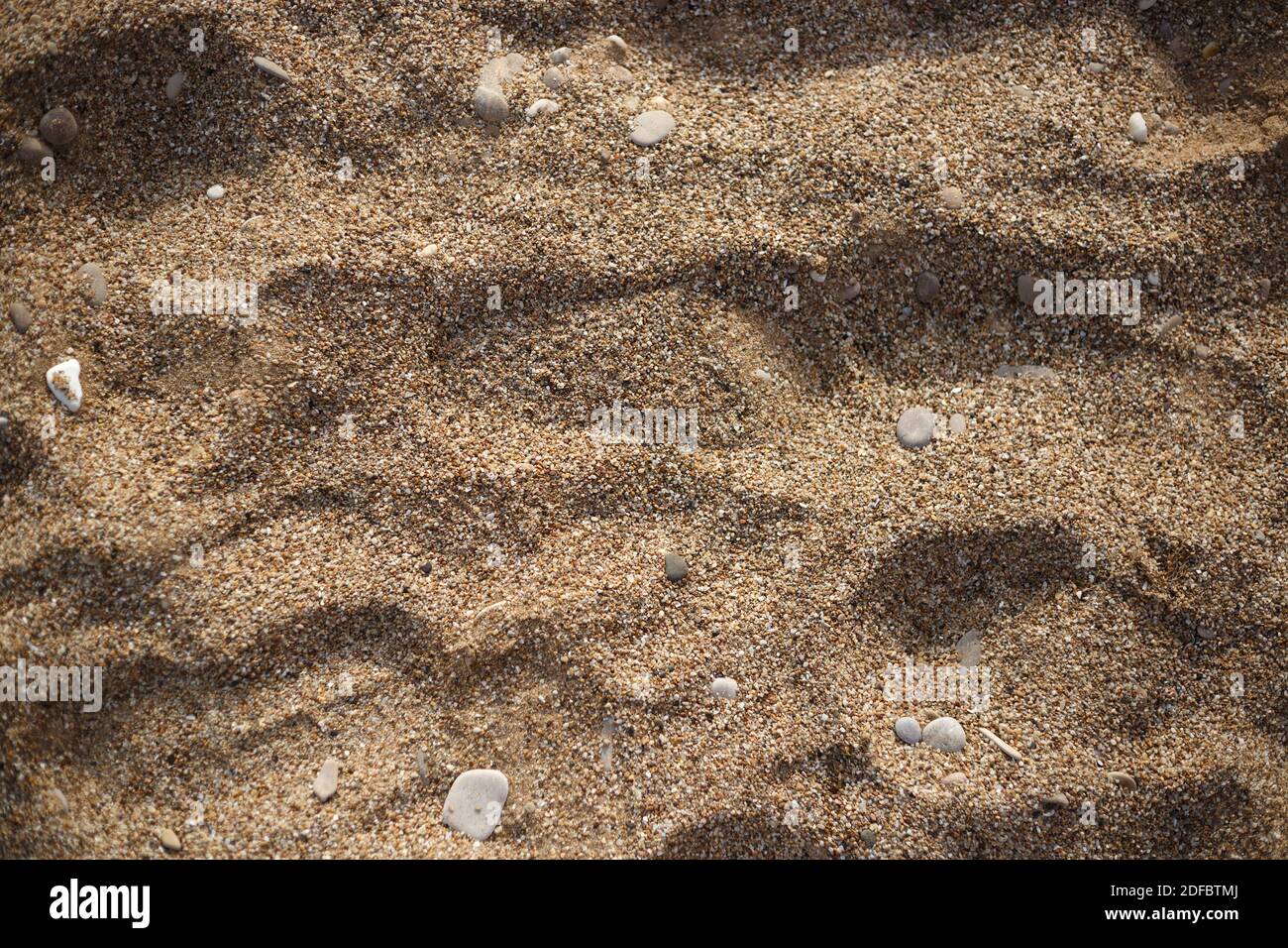 sand and stones on the beach. great background for design Stock Photo ...