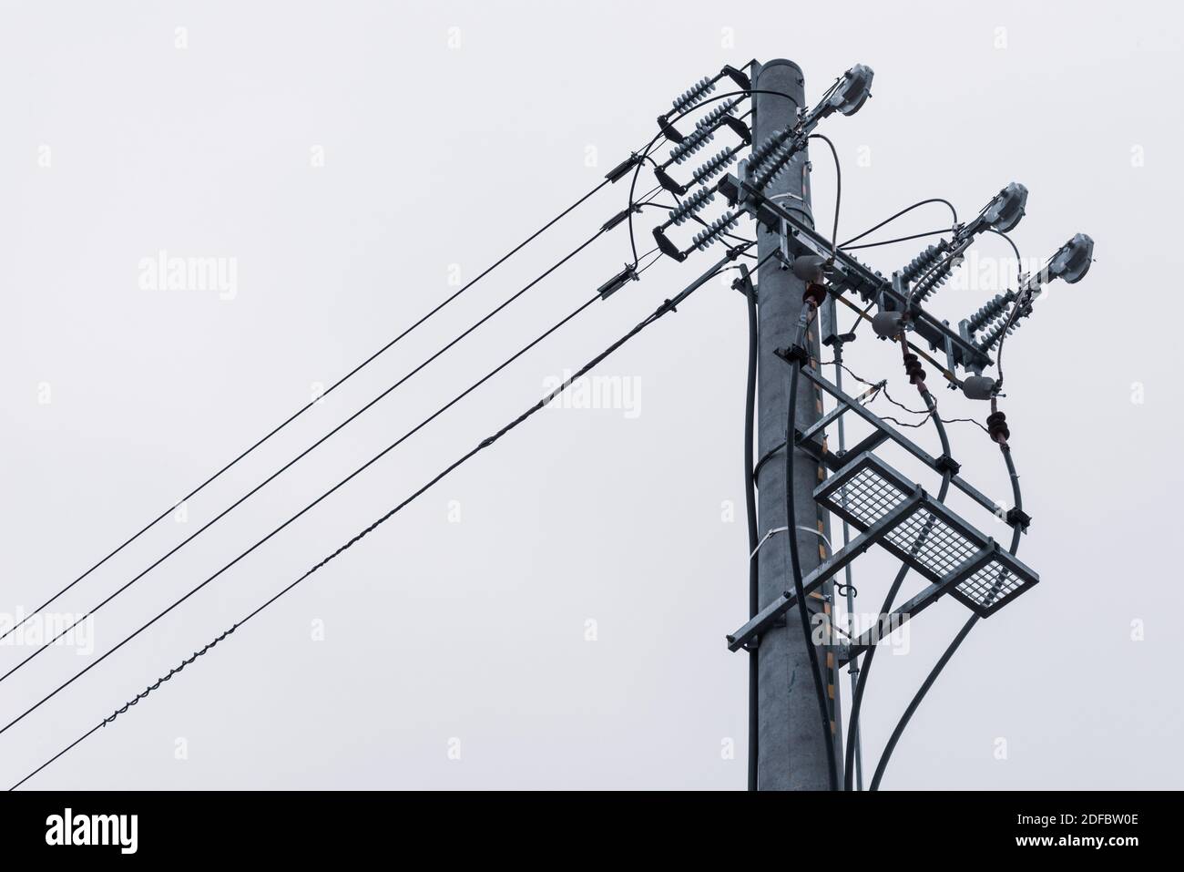 Concrete high voltage electric pillar Stock Photo - Alamy